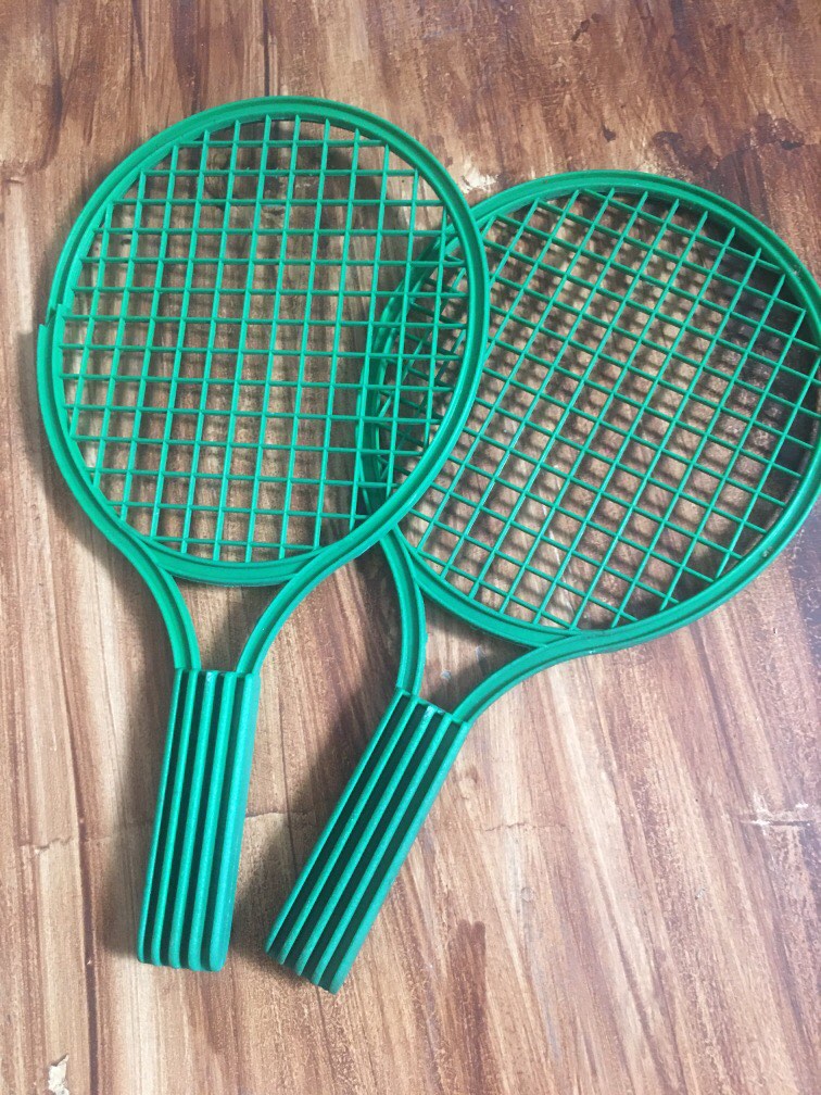 Small plastic rackets on Carousell
