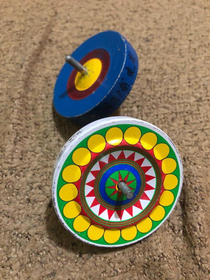 Vintage wood and tin japanese spin tops on Carousell