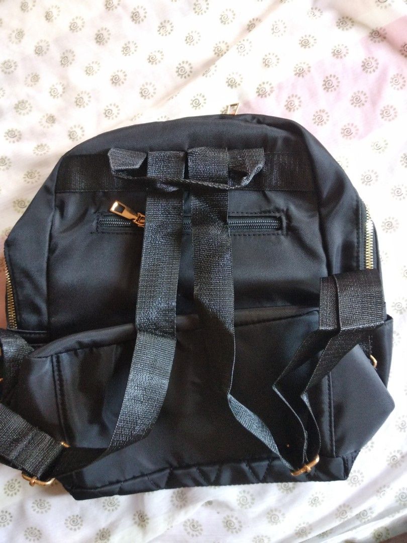 Backpack with front and back compartments with gold zips, Women's ...