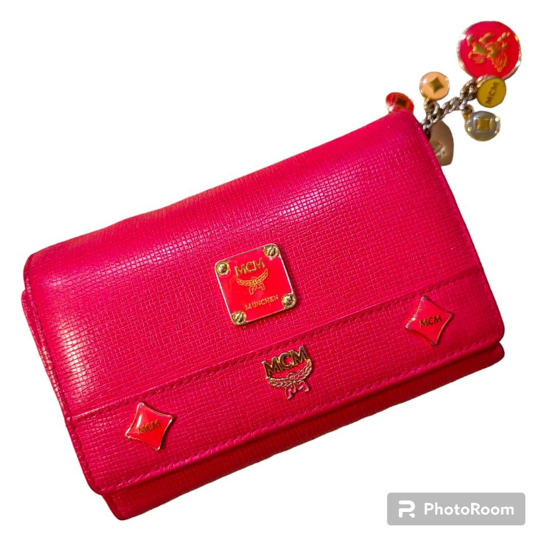 Pink MCM trifold wallet on Carousell