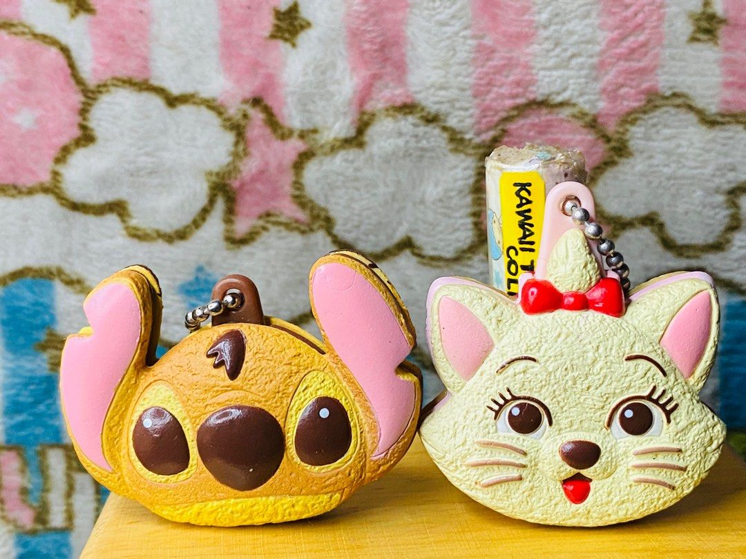 Disney Stitch & Marie Buiscuit charm 100 each on Carousell