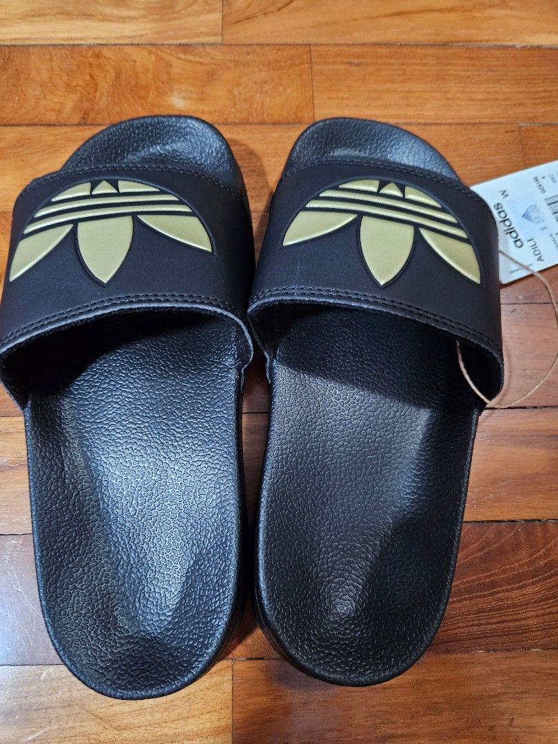 Adidas slides black with gold logo, Women's Fashion, Footwear ...