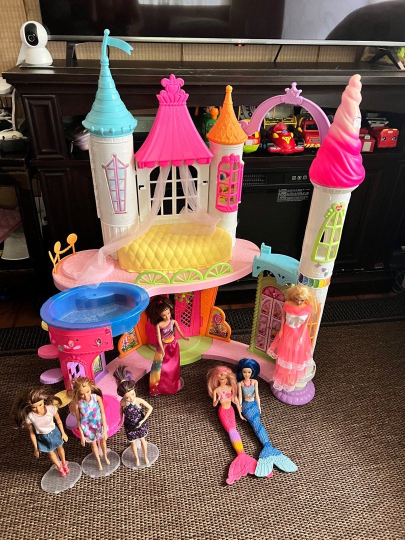 Barbie dreamtopia castle and dolls on Carousell
