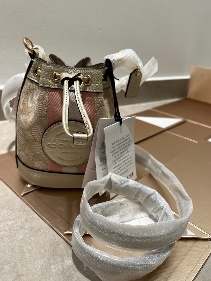 Coach Mini Dempsey Bucket Bag, Luxury, Bags & Wallets on Carousell
