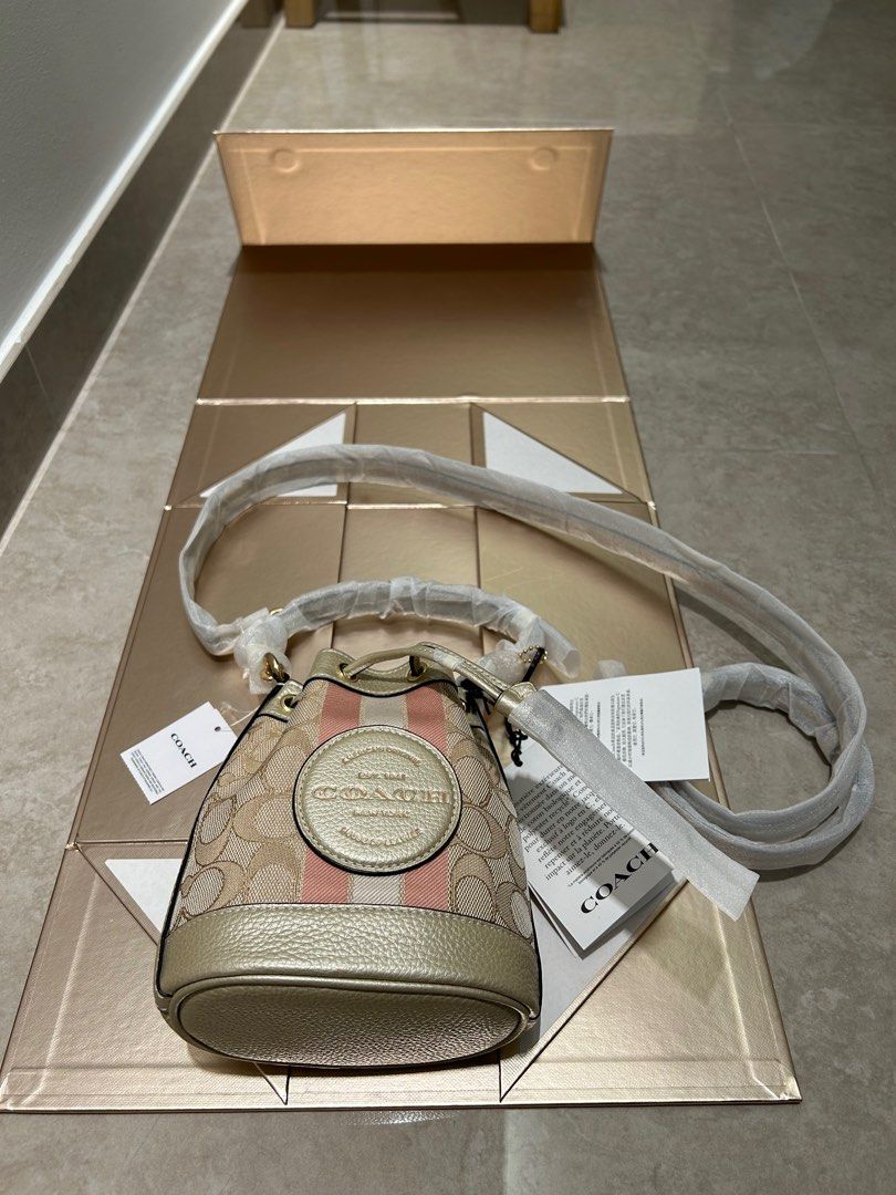 Coach Mini Dempsey Bucket Bag, Luxury, Bags & Wallets on Carousell
