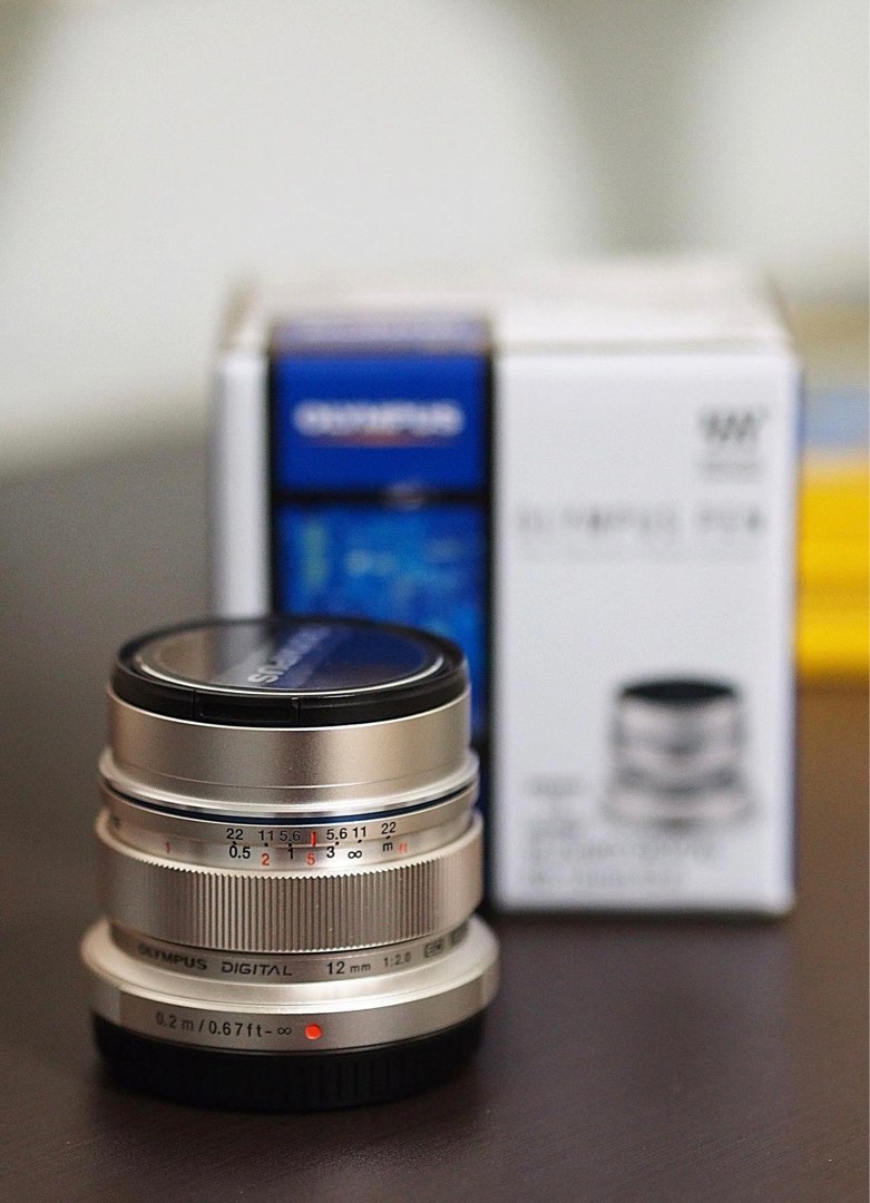 Olympus silver 12mm f/2.0 , Photography, Lens & Kits on Carousell