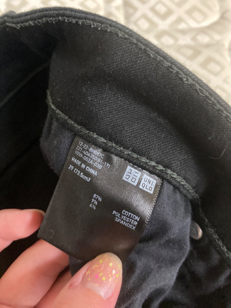 Uniqlo black ripped jeans on Carousell