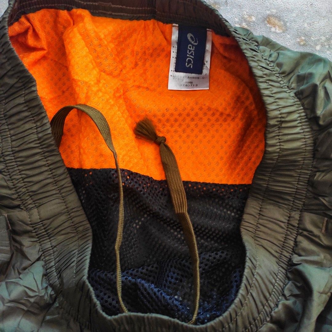 Asics track pants Camo green, Men's Fashion, Bottoms, Trousers on Carousell