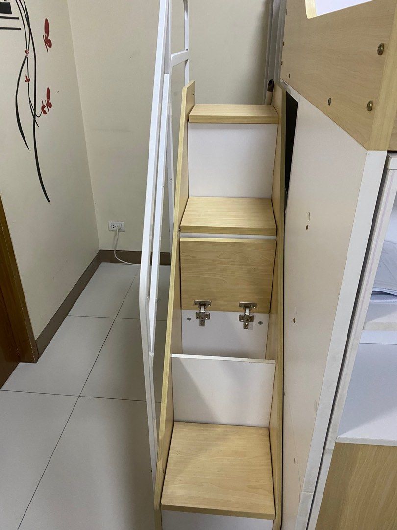 Double decker bed frame with mattress and bookshelf and large storage ...