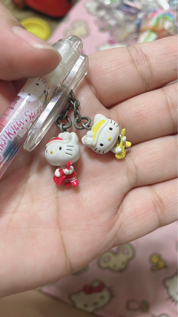 Rare shinjuku Hello kitty charms keychains on Carousell
