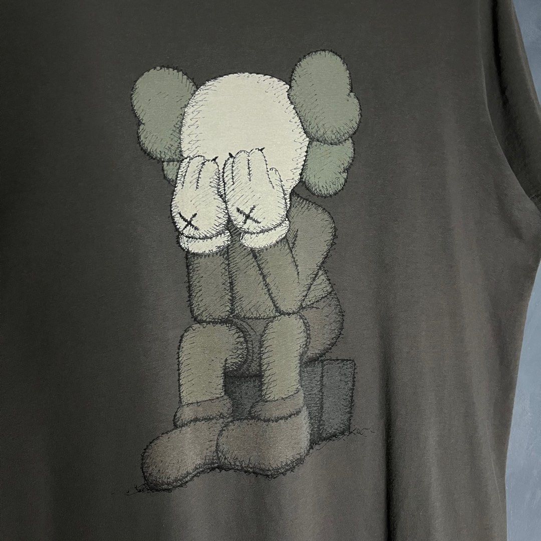 Uniqlo X Kaws Sad, Men's Fashion, Tops & Sets, Tshirts & Polo Shirts on ...