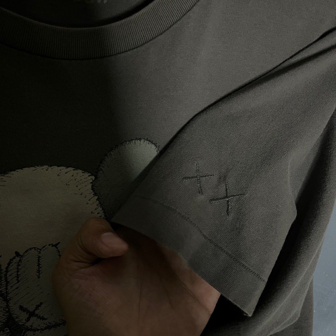 Uniqlo X Kaws Sad, Men's Fashion, Tops & Sets, Tshirts & Polo Shirts on ...