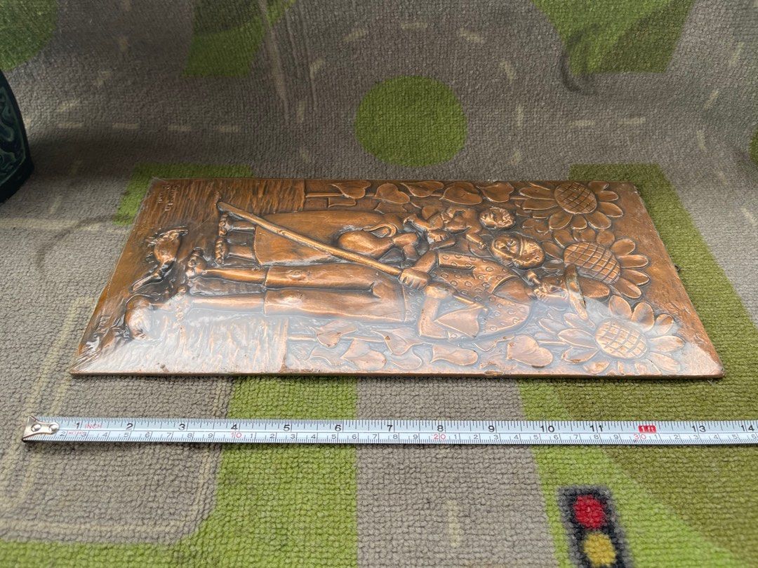 Vintage Copper Artwork Display Embossed copper art design with markings ...