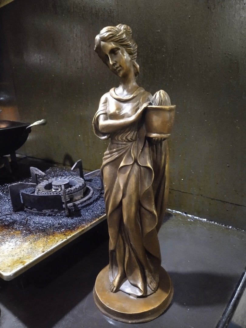 Brass lady statue display on Carousell