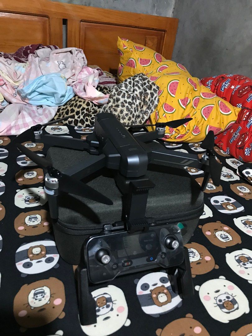Drone f11s 4k pro, Photography, Drones on Carousell