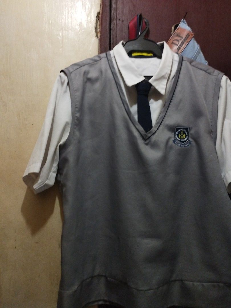 Used STI uniform (Top only), Men's Fashion, Tops & Sets, Vests on Carousell