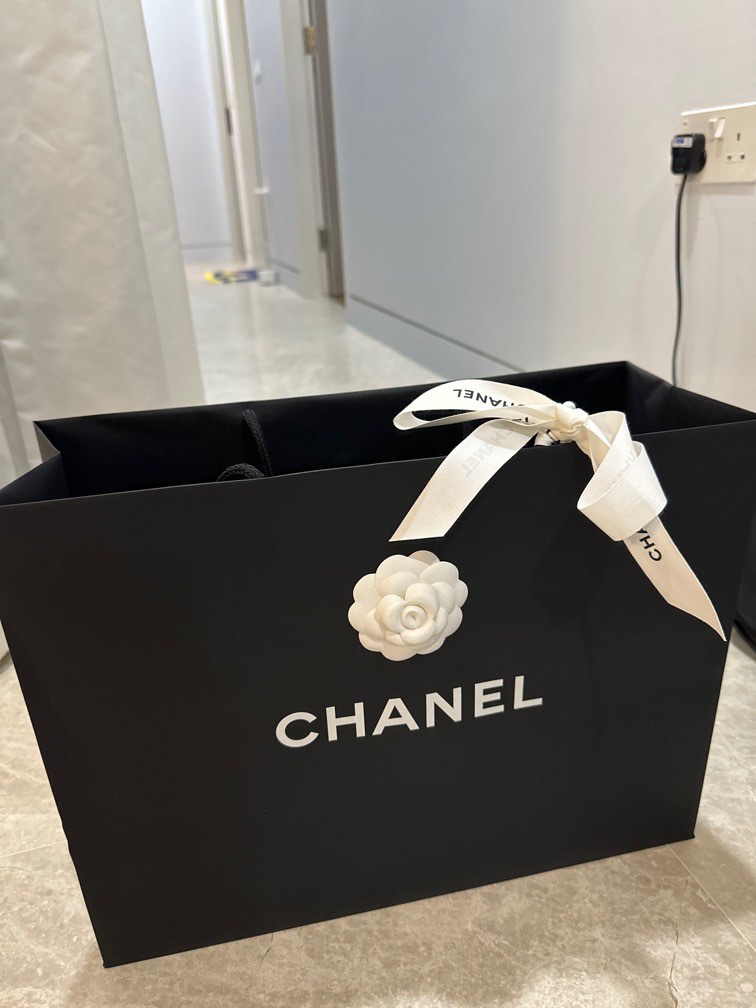 Chanel paper bag, Luxury, Bags & Wallets on Carousell