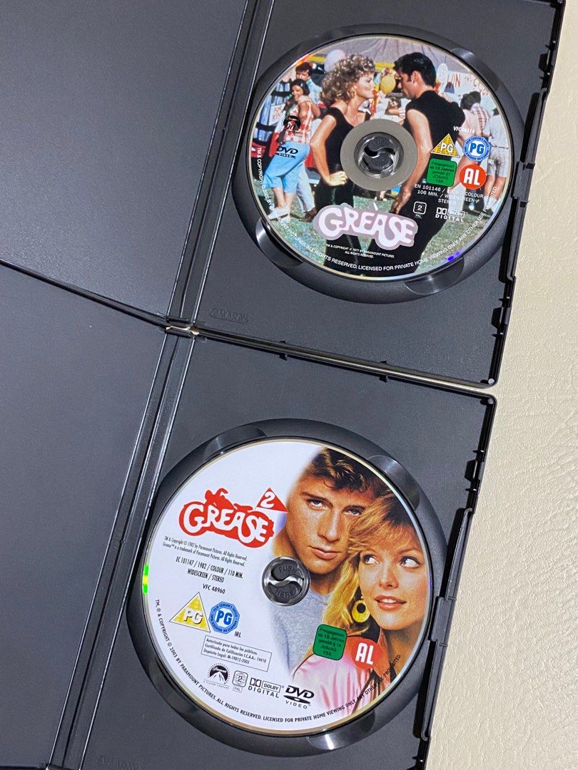 Authentic Grease DVDs: Grease & Grease 2, Hobbies & Toys, Music & Media ...