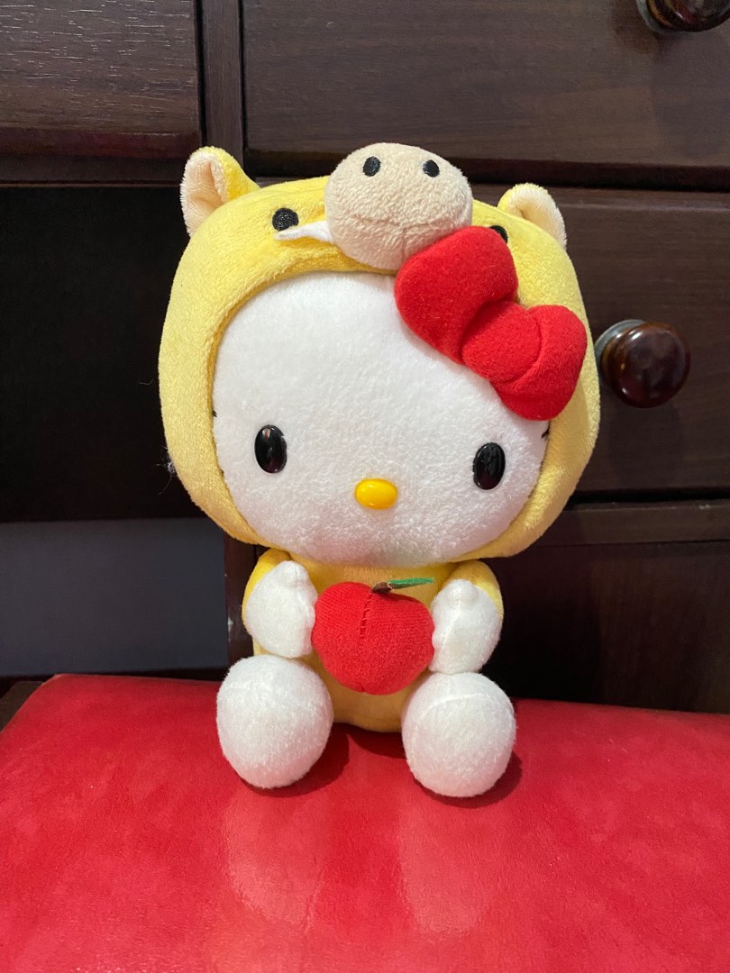 Hello kitty in pig costume on Carousell