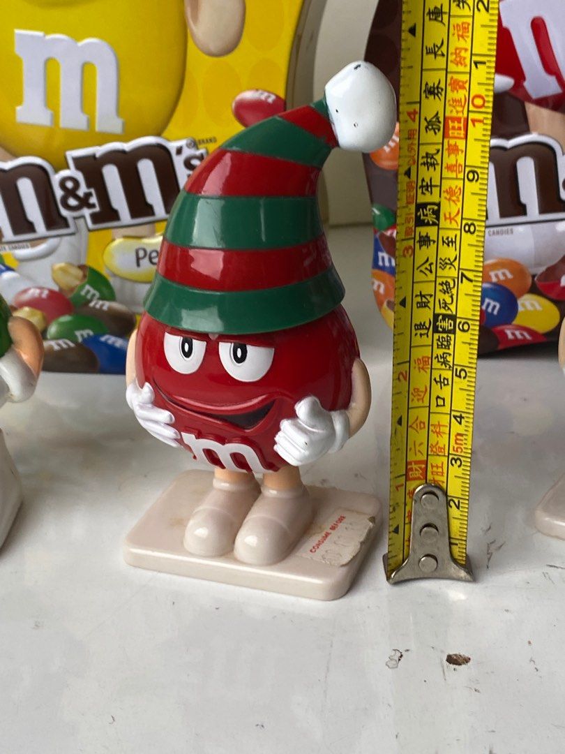 M&M collectible tin can and figurines on Carousell