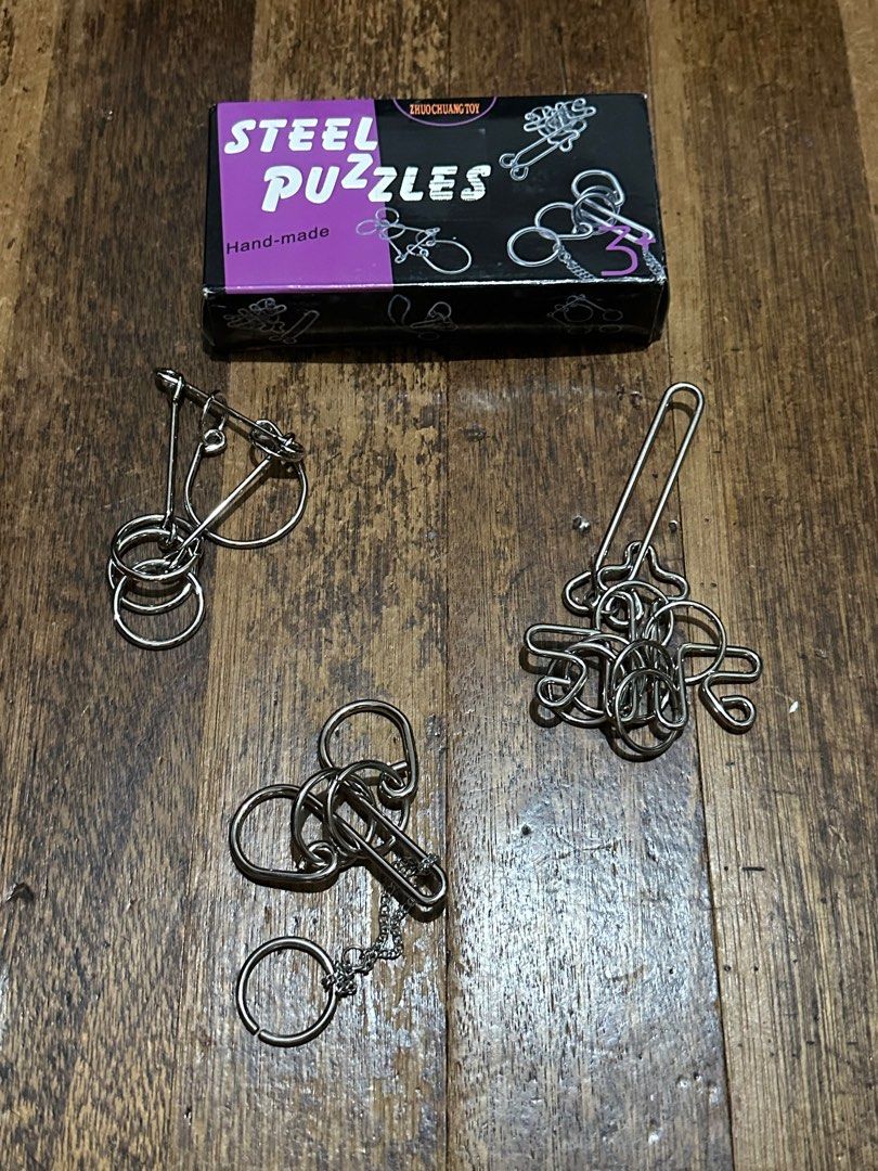 Steel Puzzles (Set of 3) on Carousell