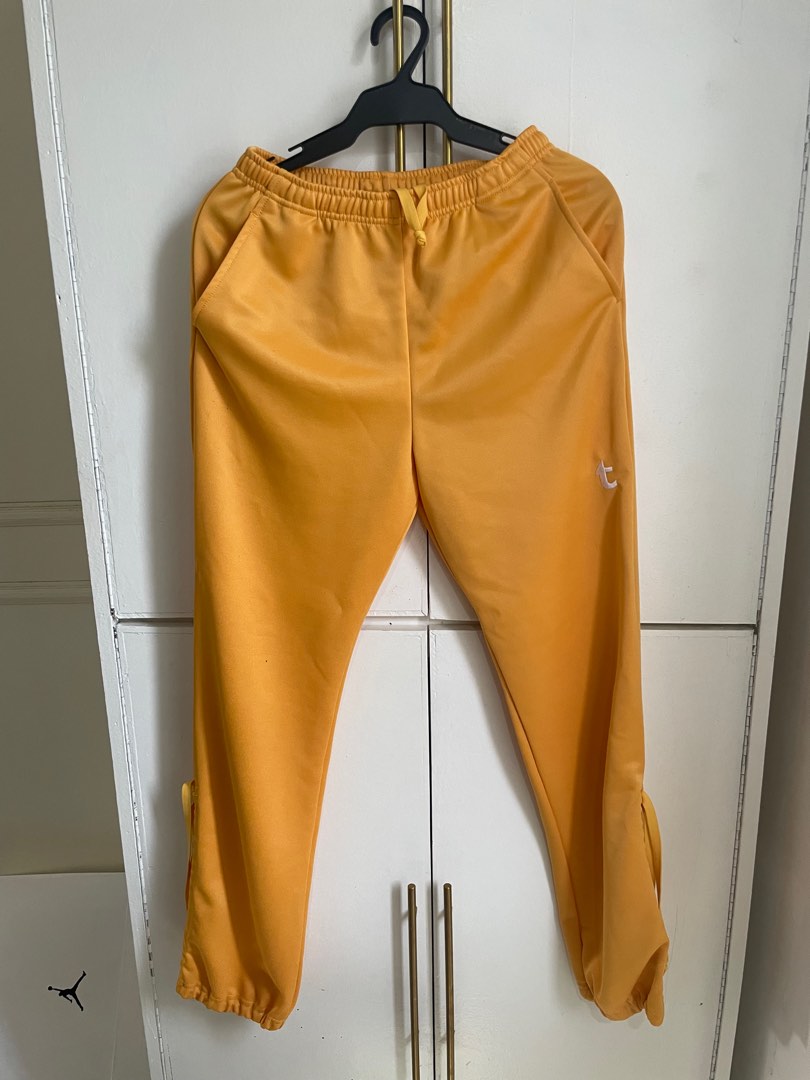 Teruyuki Yellow jogger track pants on Carousell
