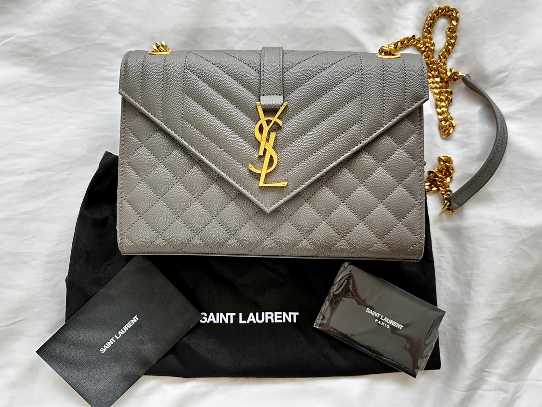YSL envelope medium in grey with gold hardware, Luxury, Bags & Wallets ...