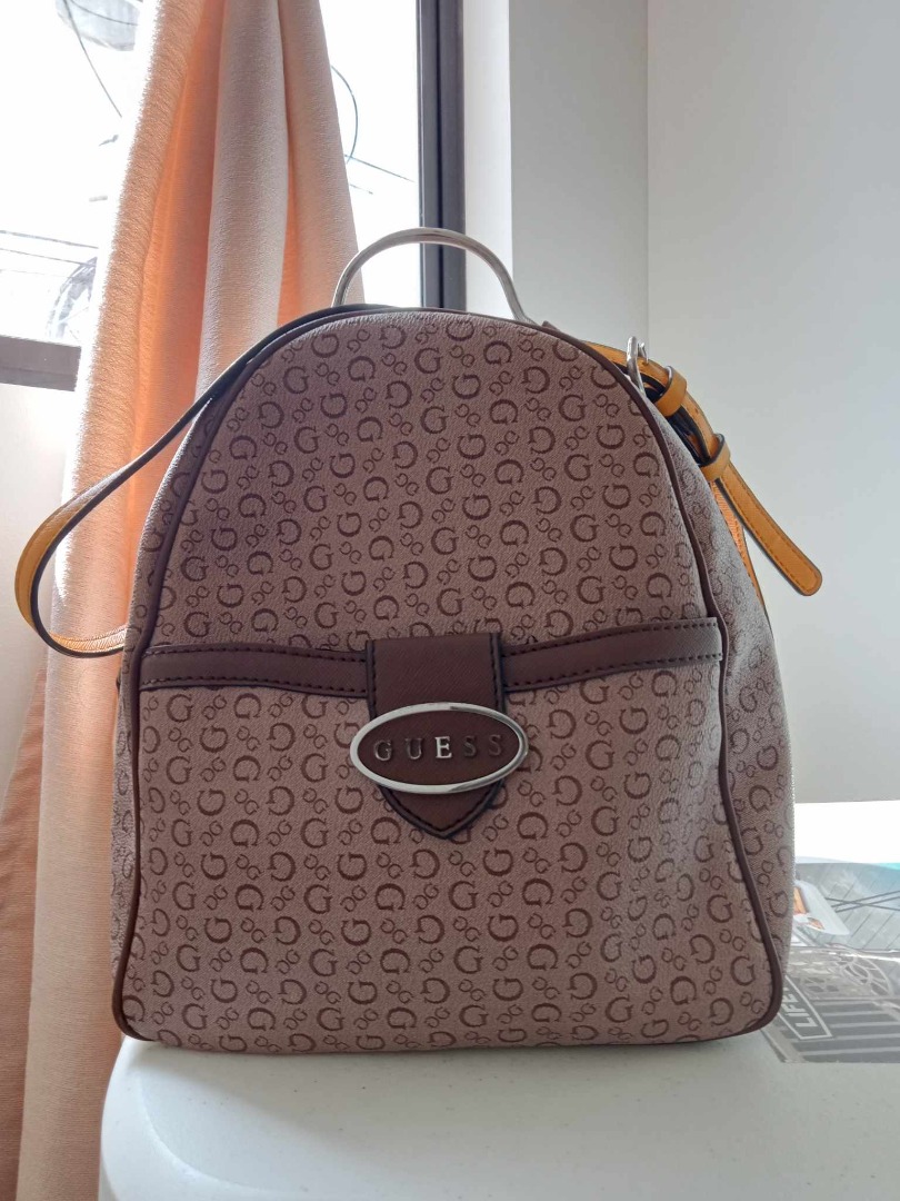 original GUESS Women's Logo Backpack Signature Brown/ Yellow on Carousell