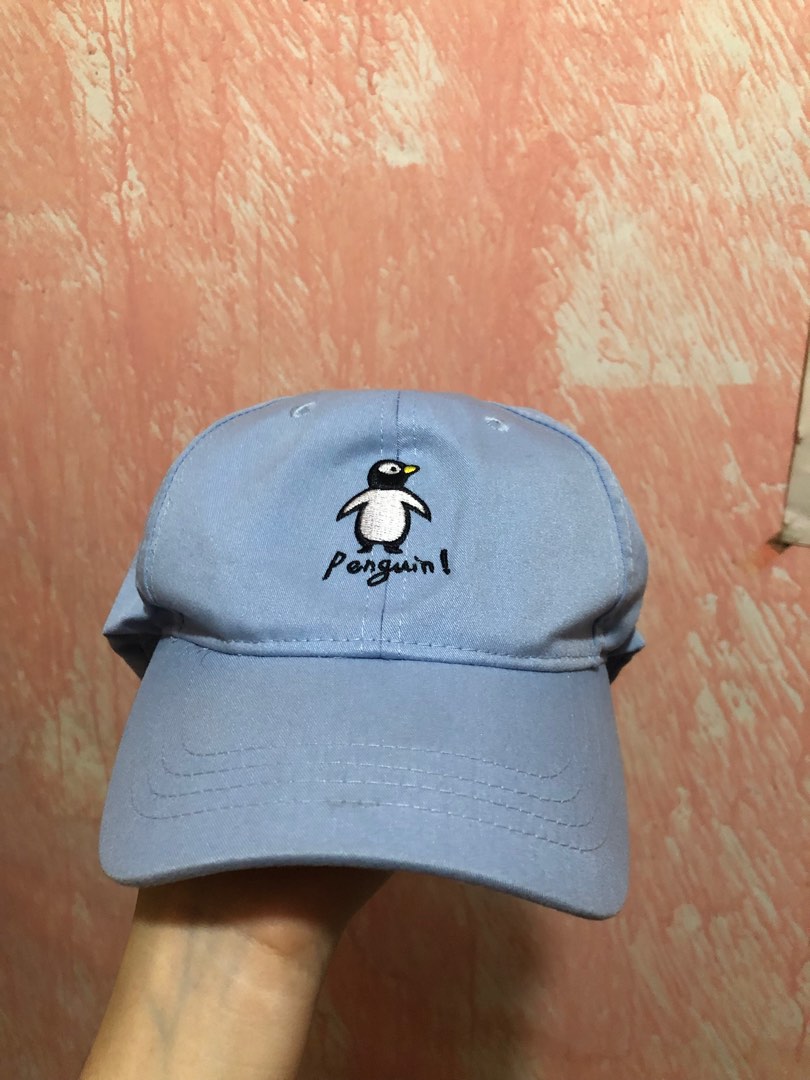 Topi Miniso Penguin Biru, Fesyen Pria, Aksesoris, Topi di Carousell