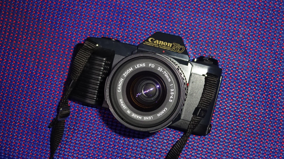 Canon T50 with Canon Zoom Lens FD 35-70mm f3.5-4.5, Photography, Cameras on Carousell