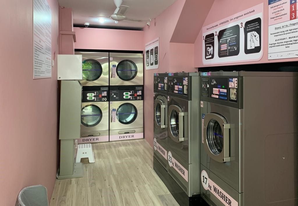 Coin-operated Laundromat, laundry washing machine washer dryer, TV ...