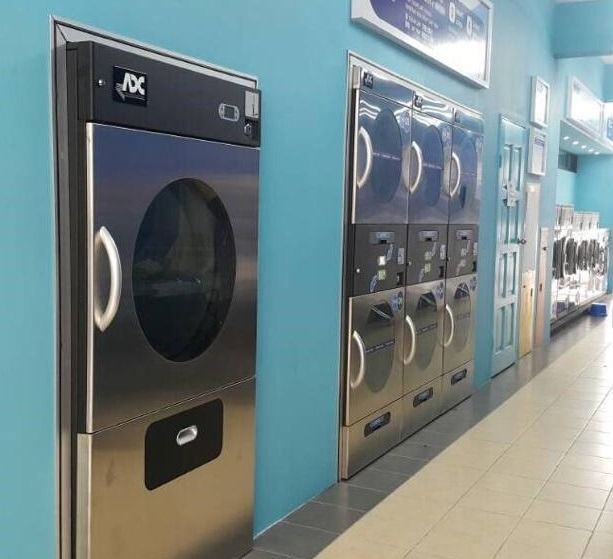 Coin-operated Laundromat, laundry washing machine washer dryer, TV ...