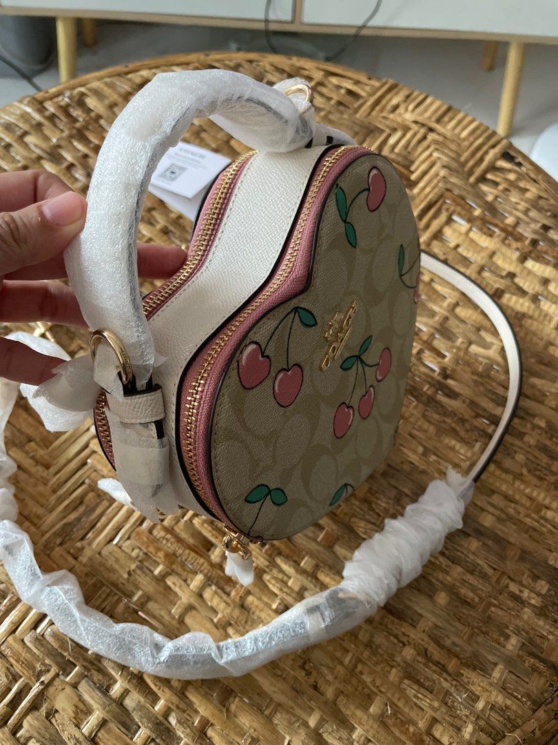 coach heart crossbody in signature canvas w heart cherry print on Carousell