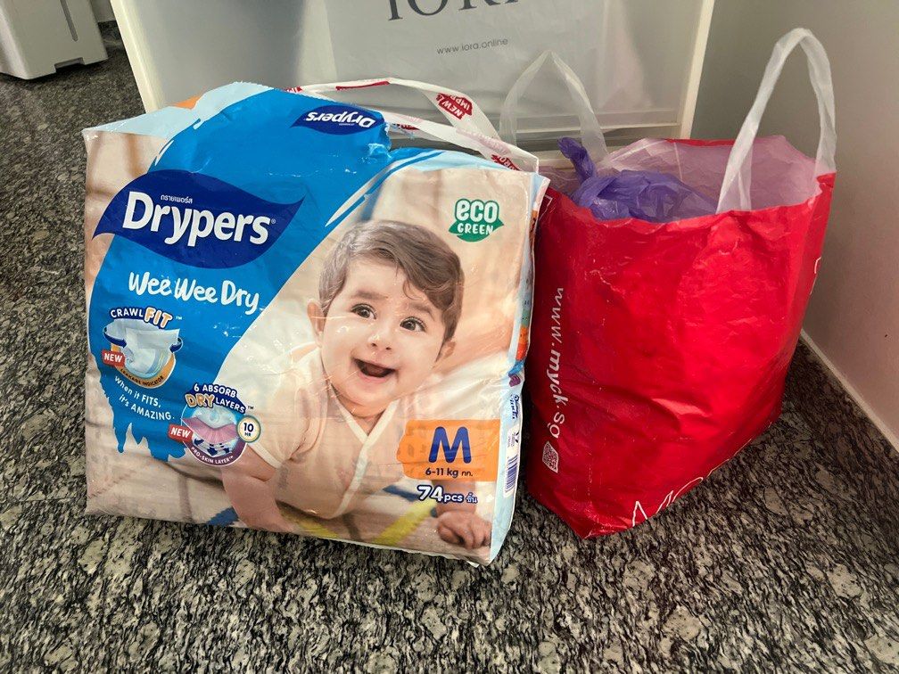 Drypers Diaper and some Merries diapers, Babies & Kids, Bathing ...