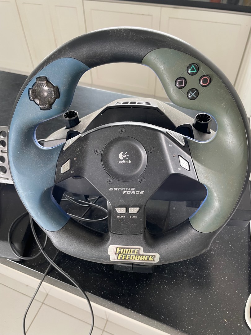 Logitech steering wheel pedal set Playstation controller, Video Gaming ...