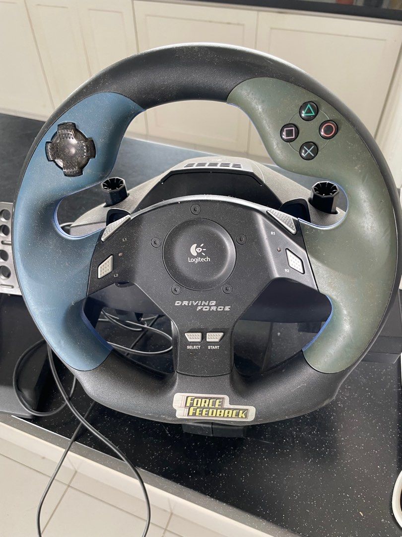 Logitech steering wheel pedal set Playstation controller, Video Gaming ...