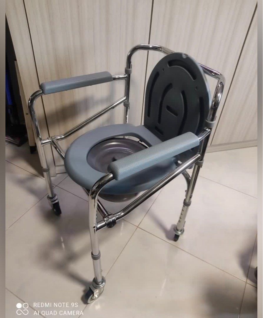 Brand New Commode with wheels comes with free portable urinal bottle ...