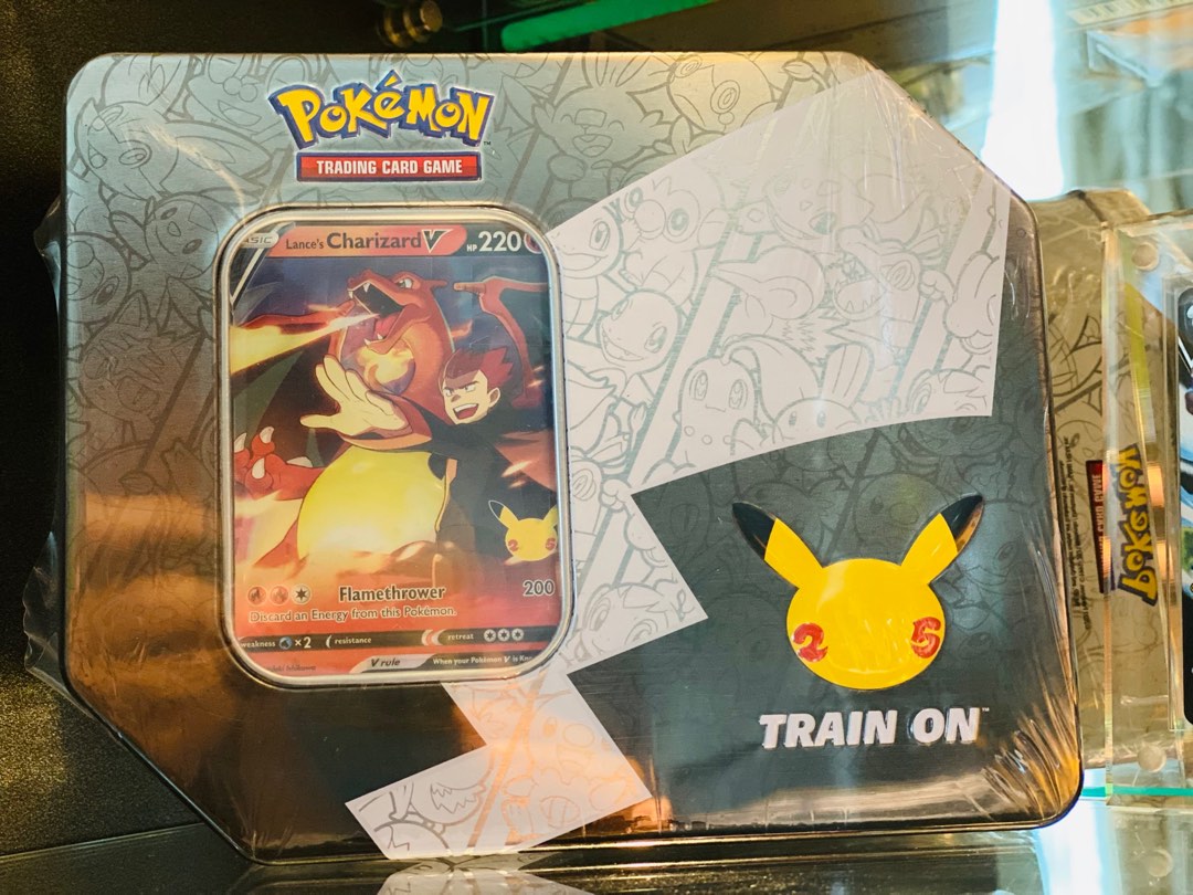 Pokemon 25th charizard tin, Hobbies & Toys, Toys & Games on Carousell