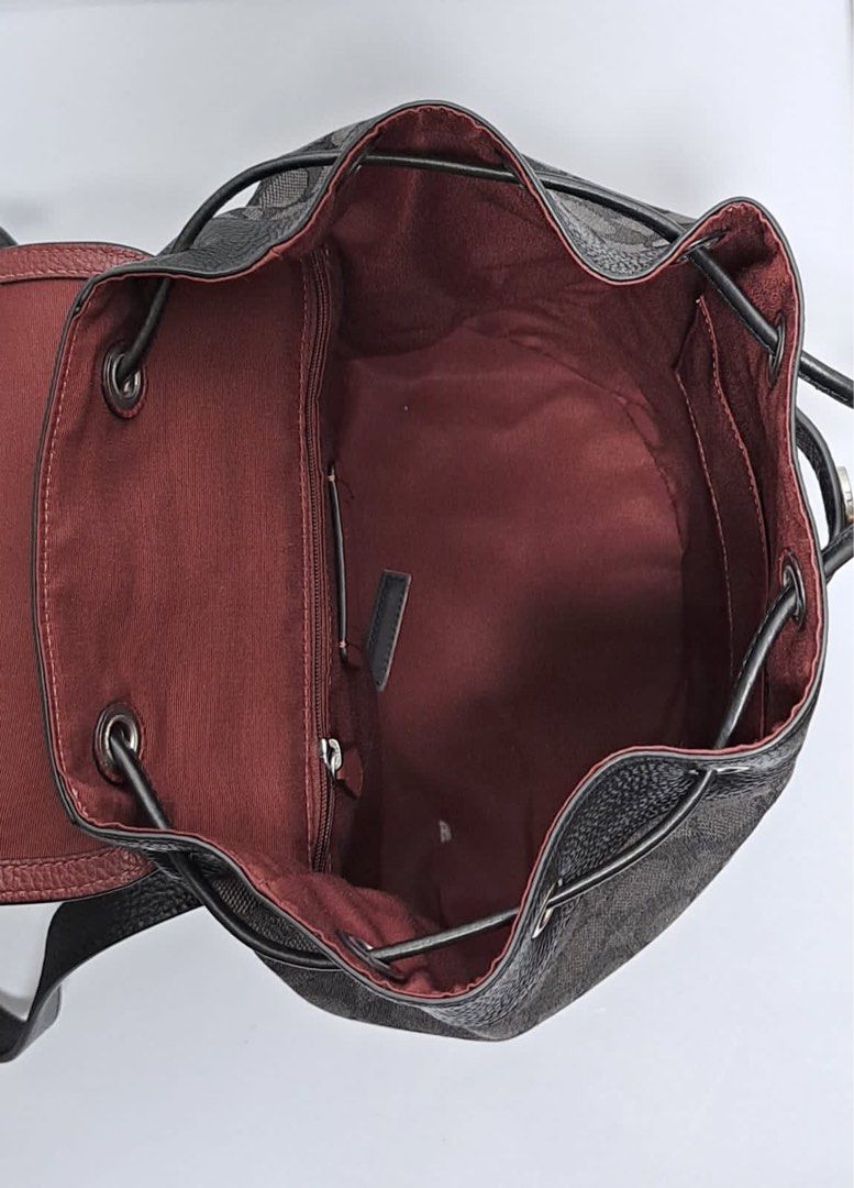 Coach drawstring backpck Original on Carousell