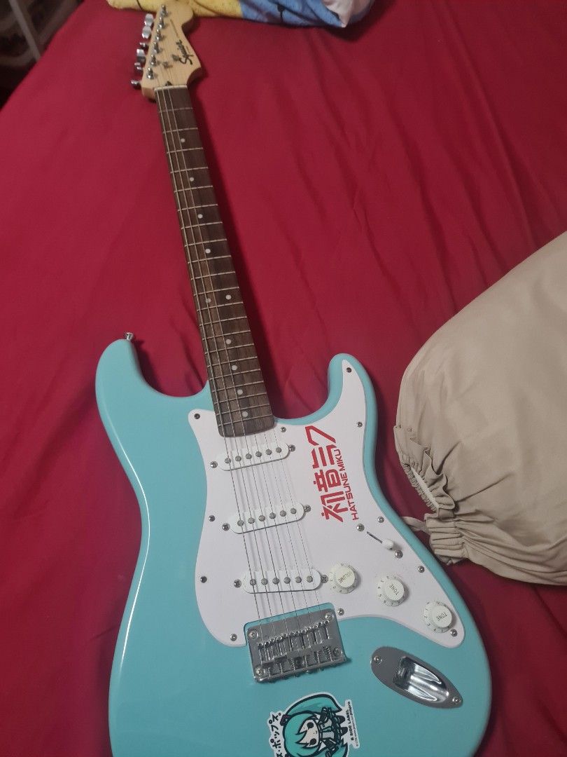 Electric blue cyan hatsune miku themed squier guitar with amp set ...