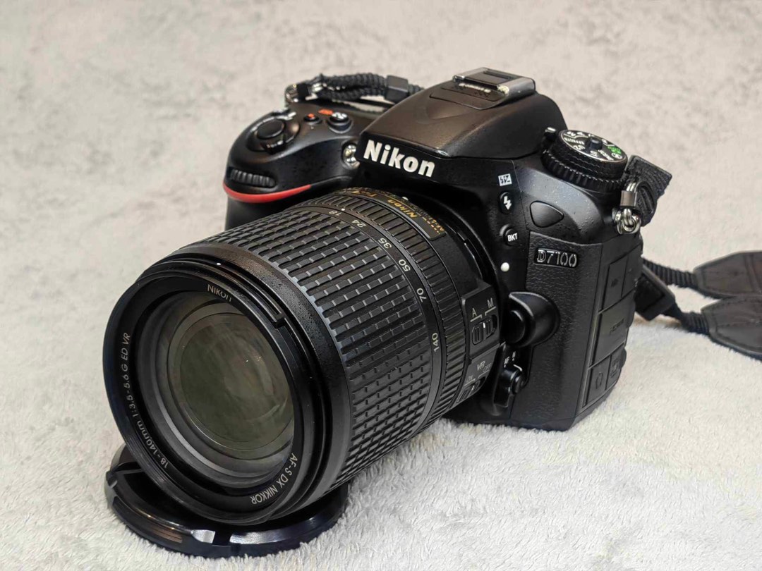 Nikon D 7100 DSLR + 18-140mm (8k SC), Photography, Cameras on Carousell