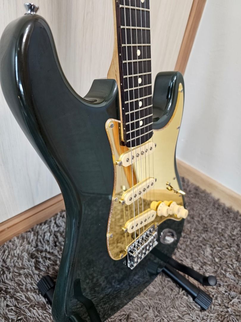 Dive into the Electric Realm with the Caliber Stratocaster Guitar - A ...