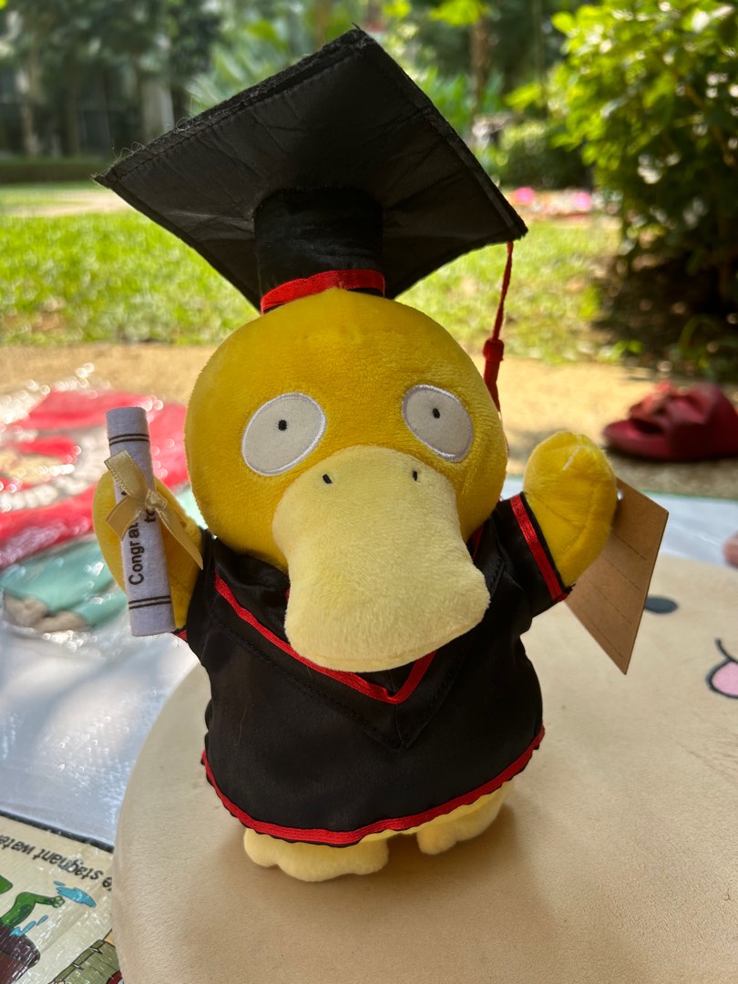 Graduation Psyduck, Hobbies & Toys, Toys & Games on Carousell