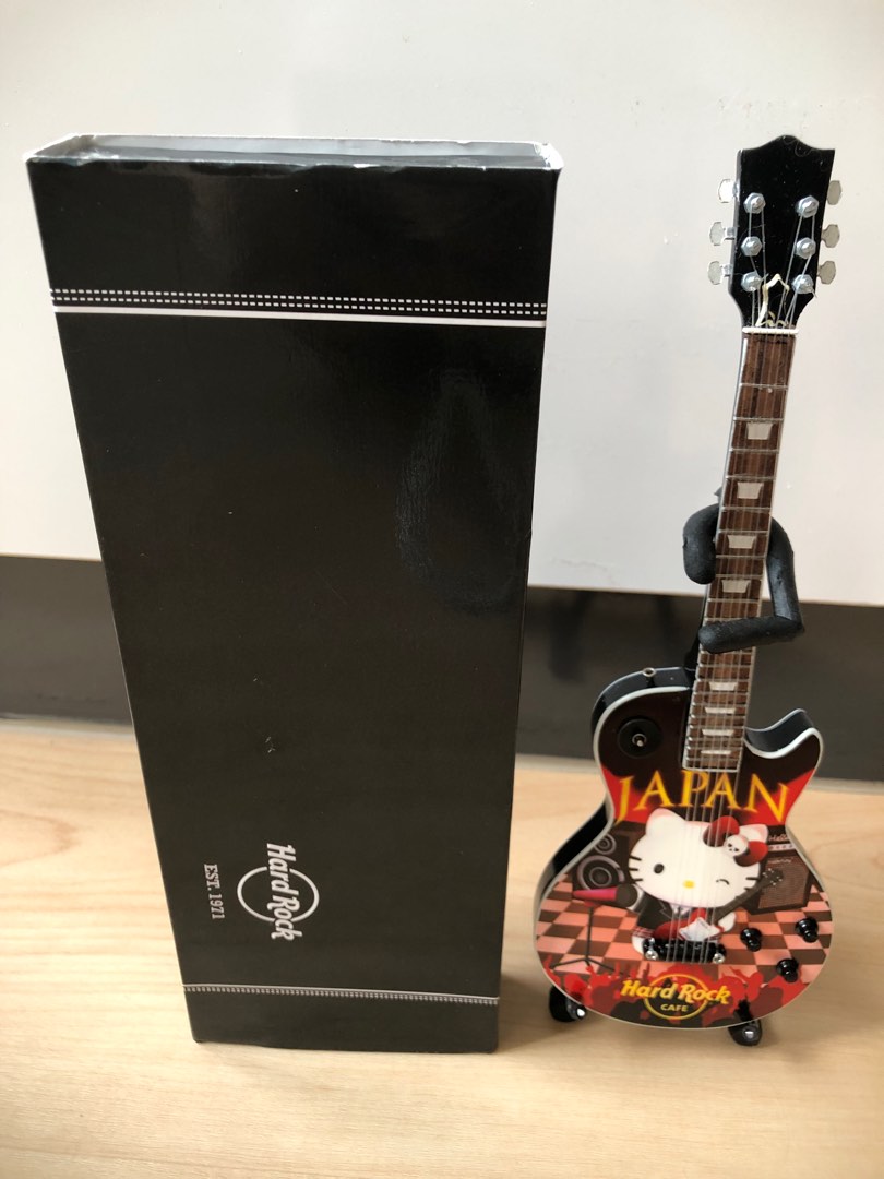 Hello Kitty Mini Hard Rock Guitar, Hobbies & Toys, Music & Media ...