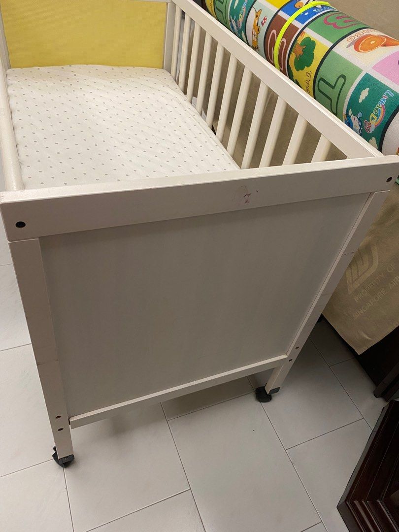 Ikea Baby Cot with wheels and mattress, Babies & Kids, Baby Nursery ...