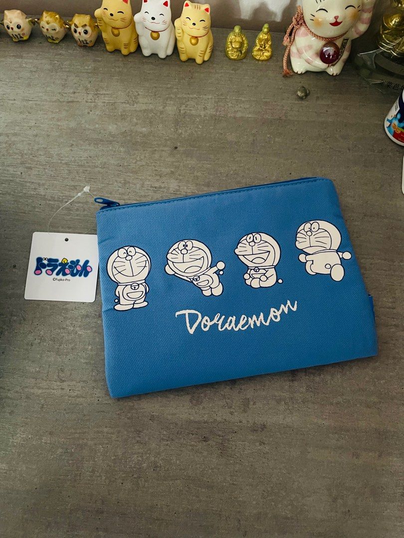 Doraemon cushioned pouch, Women's Fashion, Bags & Wallets, Purses & Pouches on Carousell