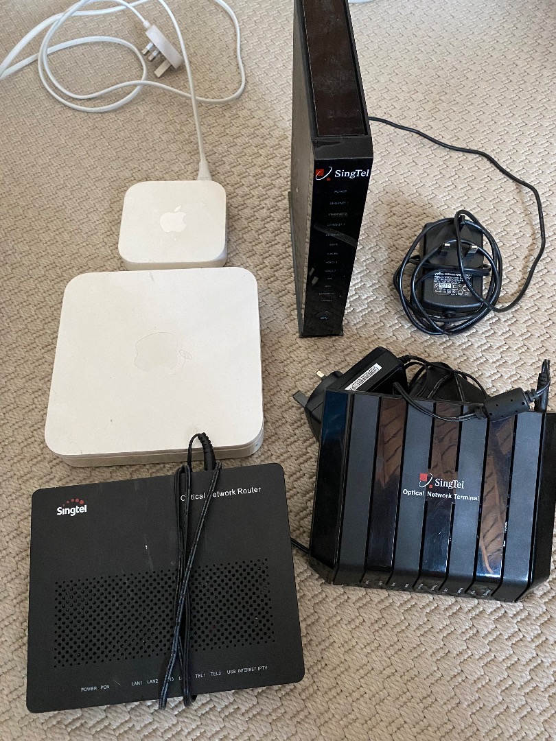 Old Apple and Singtel routers, Computers & Tech, Parts & Accessories ...