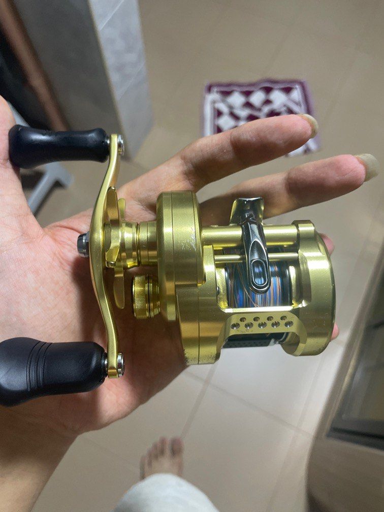 Calcutta Conquest 200 and Shimano Reel with two rods, Sports Equipment ...