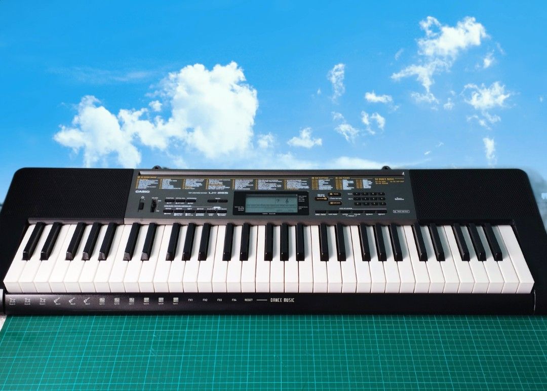 Casio piano keyboard with Touch Response and Lighted Keys features ...
