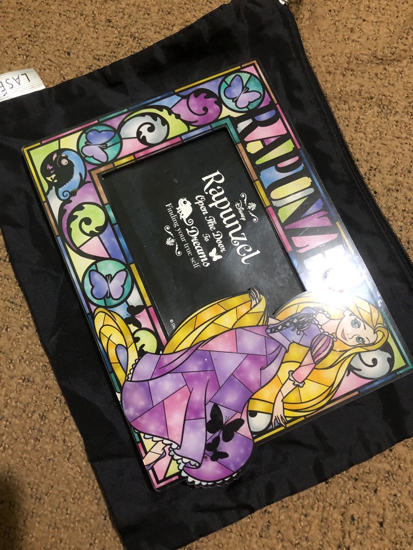 Disney rapunzel thin desk frame on Carousell